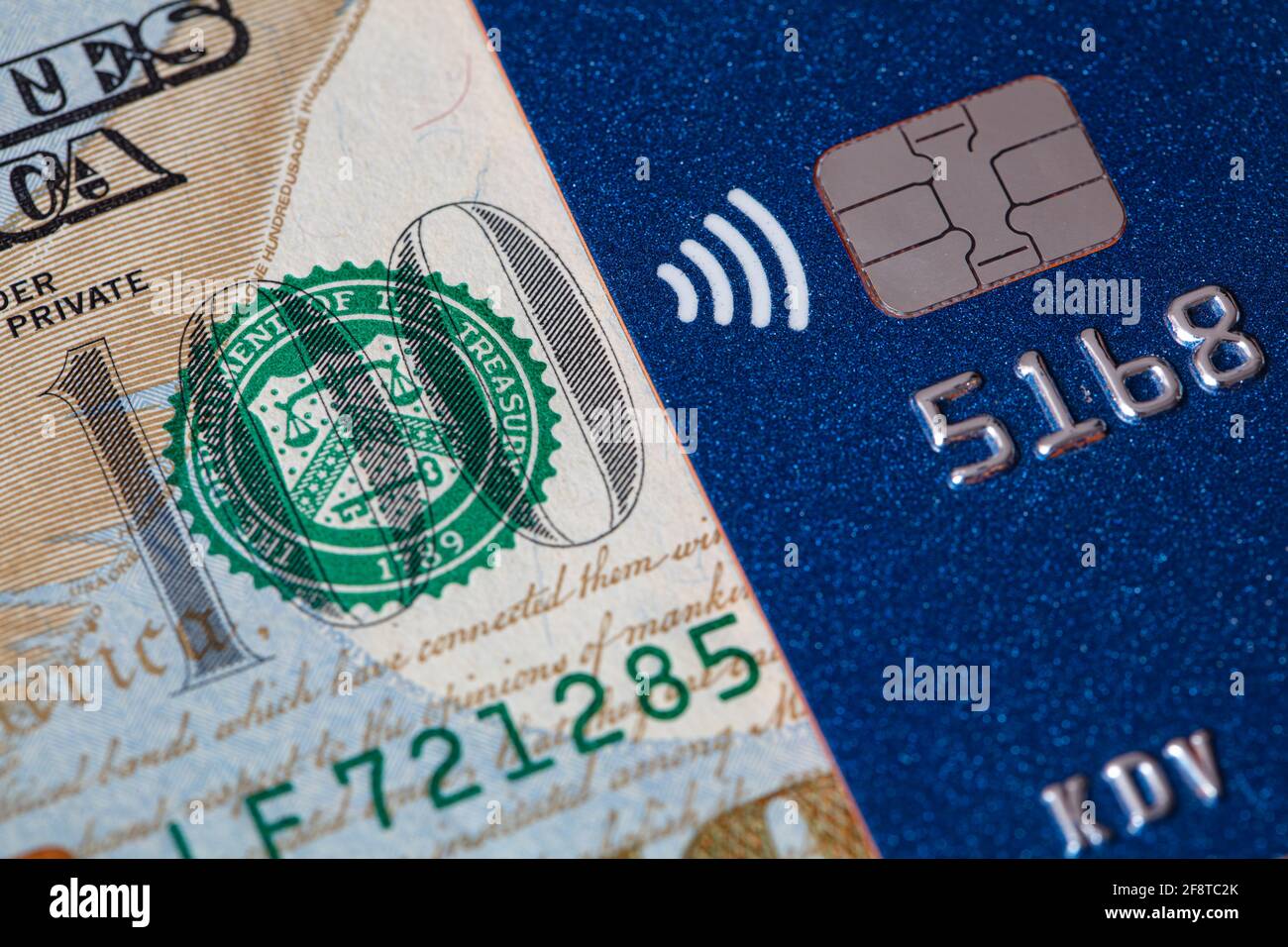 Debit card and US 100 dollar banknote for design purpose Stock Photo ...