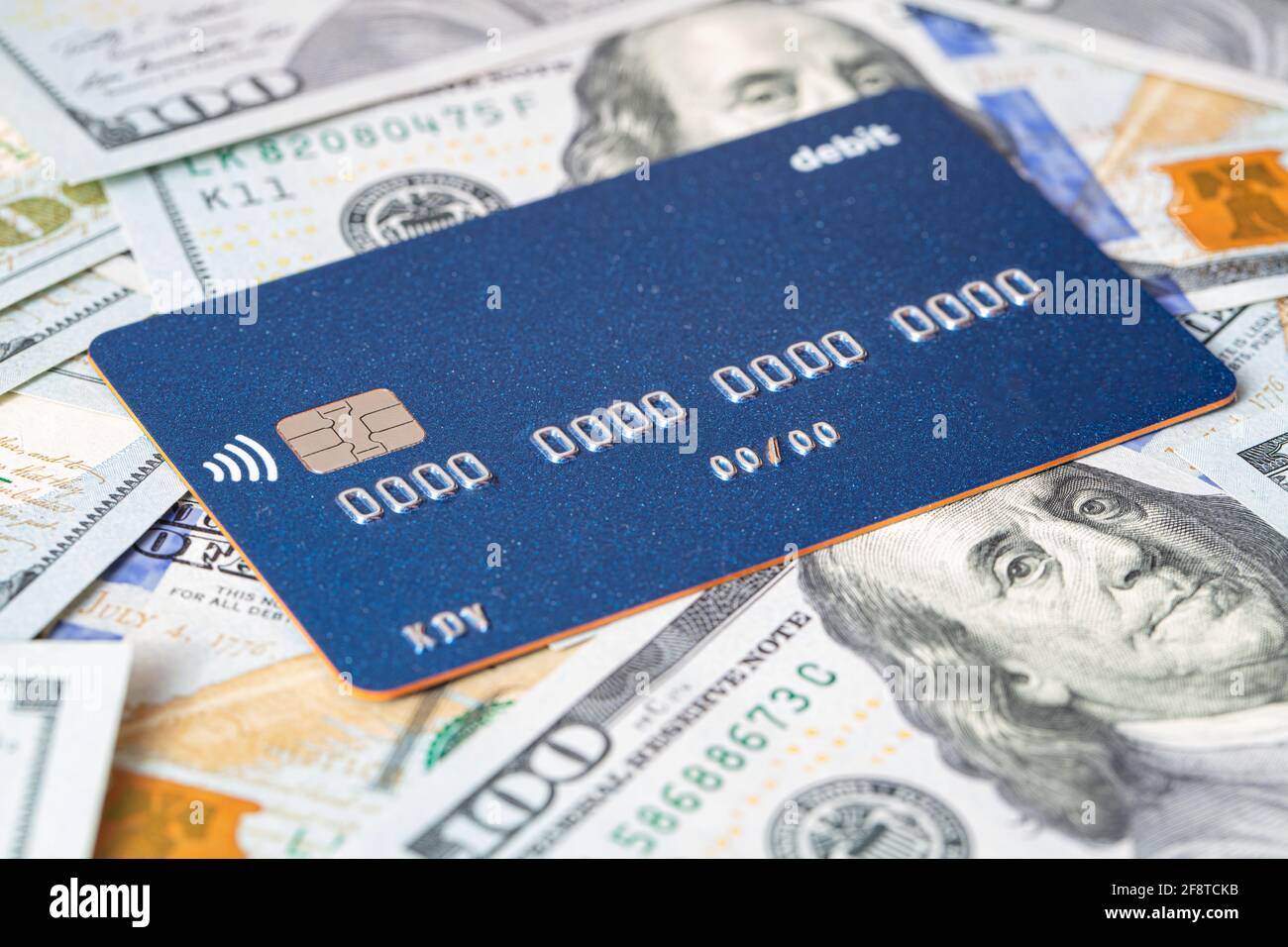 Debit card and US 100 dollar banknote for design purpose Stock Photo ...