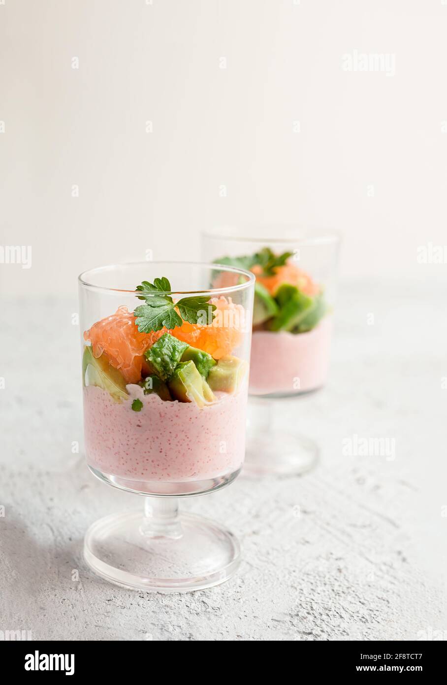 Tarama or taramasalata appetizer with avocado and pink grapefruit in ...