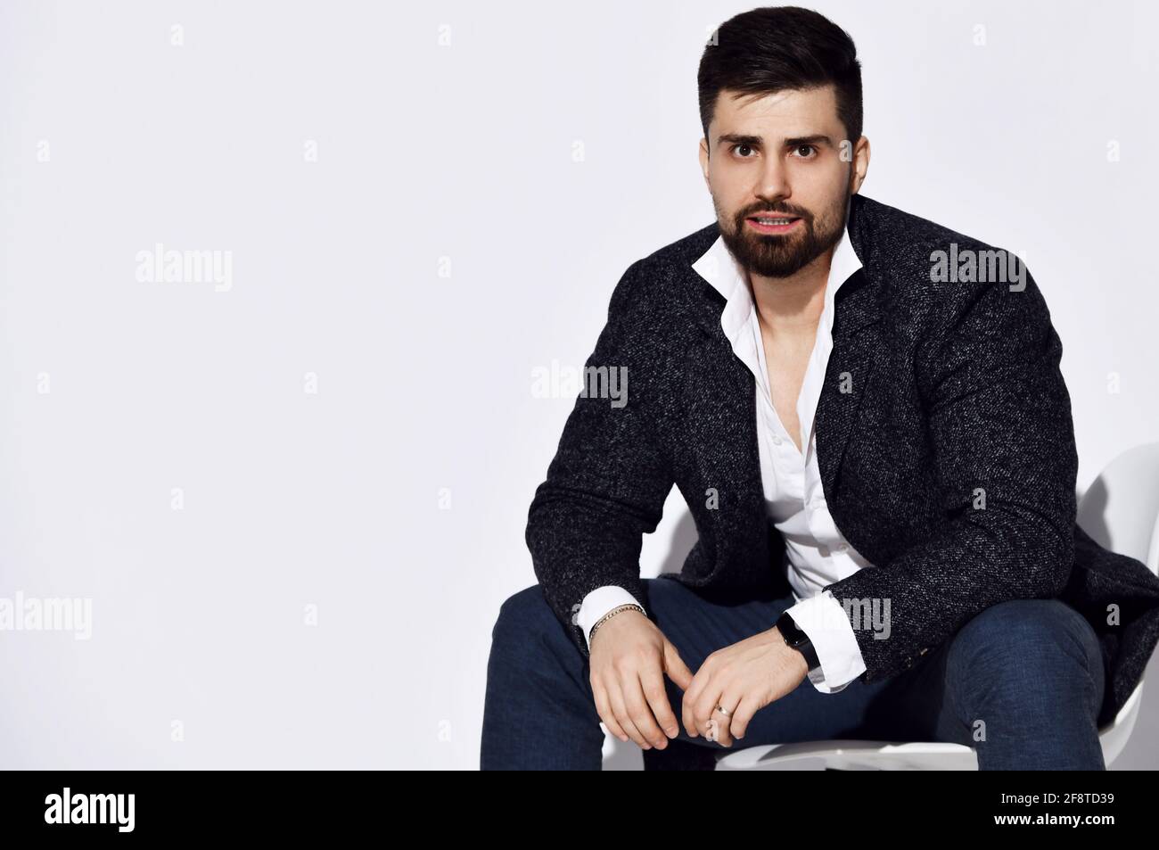 Leaning forward in chair hi-res stock photography and images - Alamy