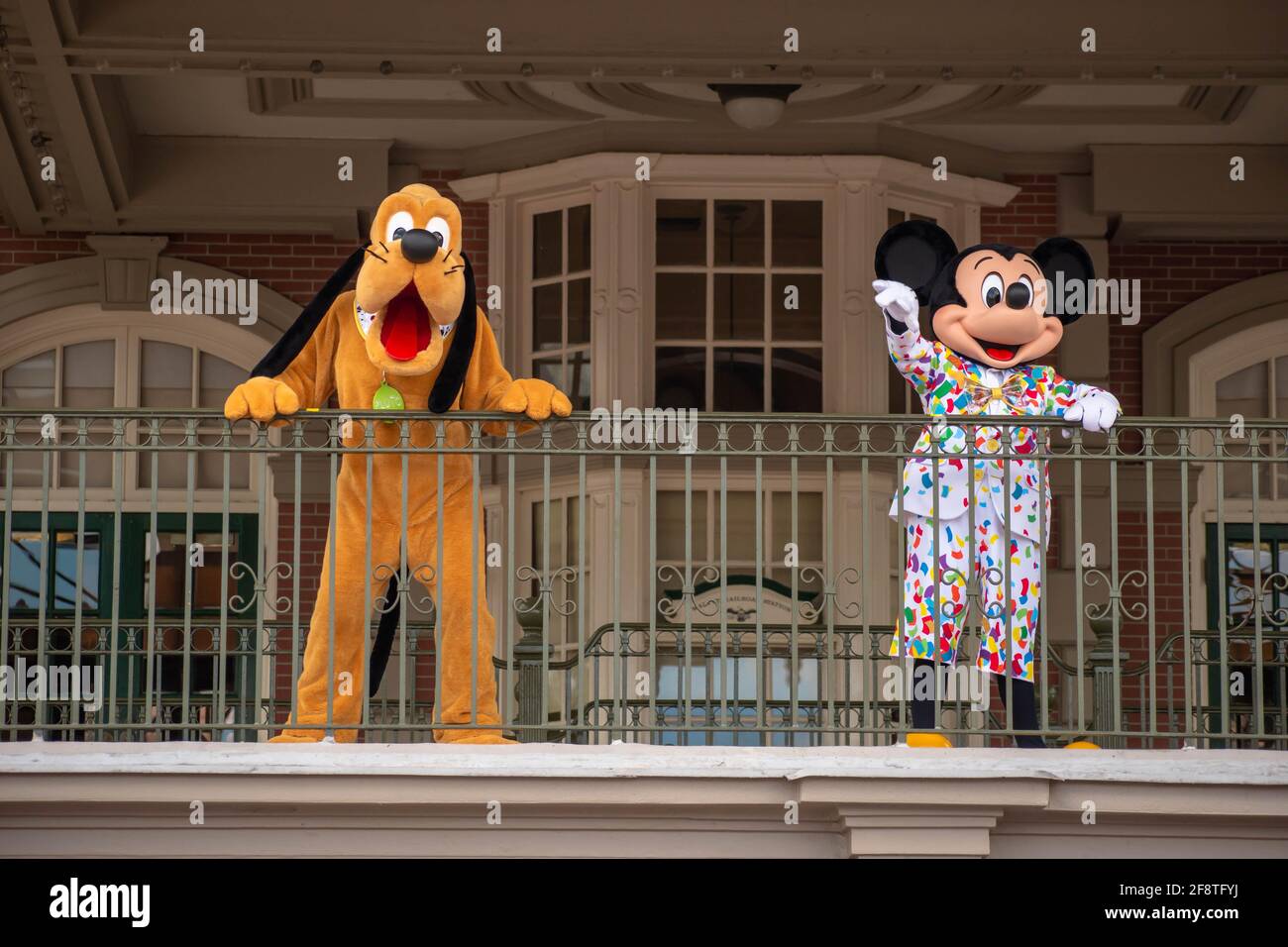 Orlando, Florida. September 02, 2020. Pluto and Mickey Mouse waving ...