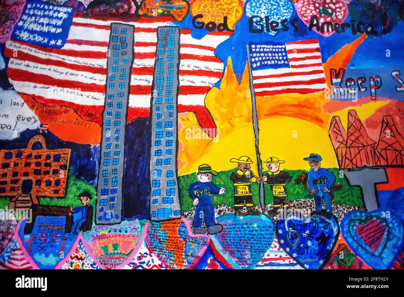 A giant mural of a firefighters polices and the original World Trade ...