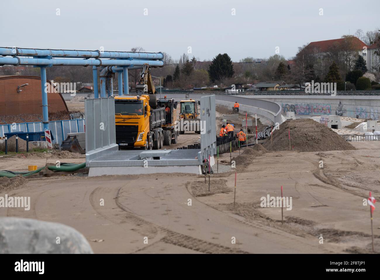 Berlin, Germany. 15th Apr, 2021. Construction vehicles stand on the ...