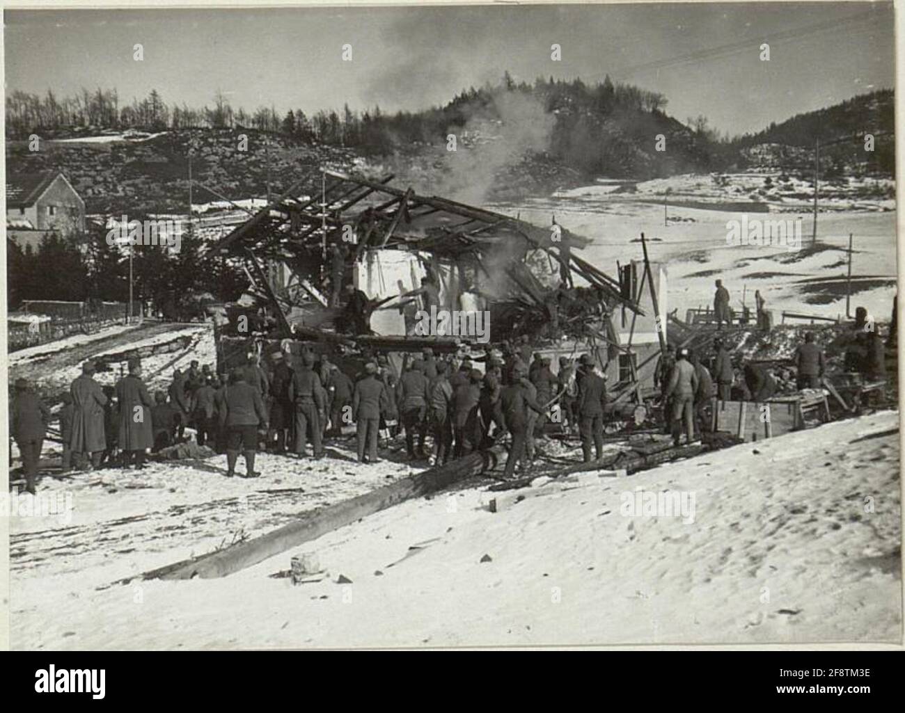 Clean up in a destroyed residential building Stock Photo - Alamy