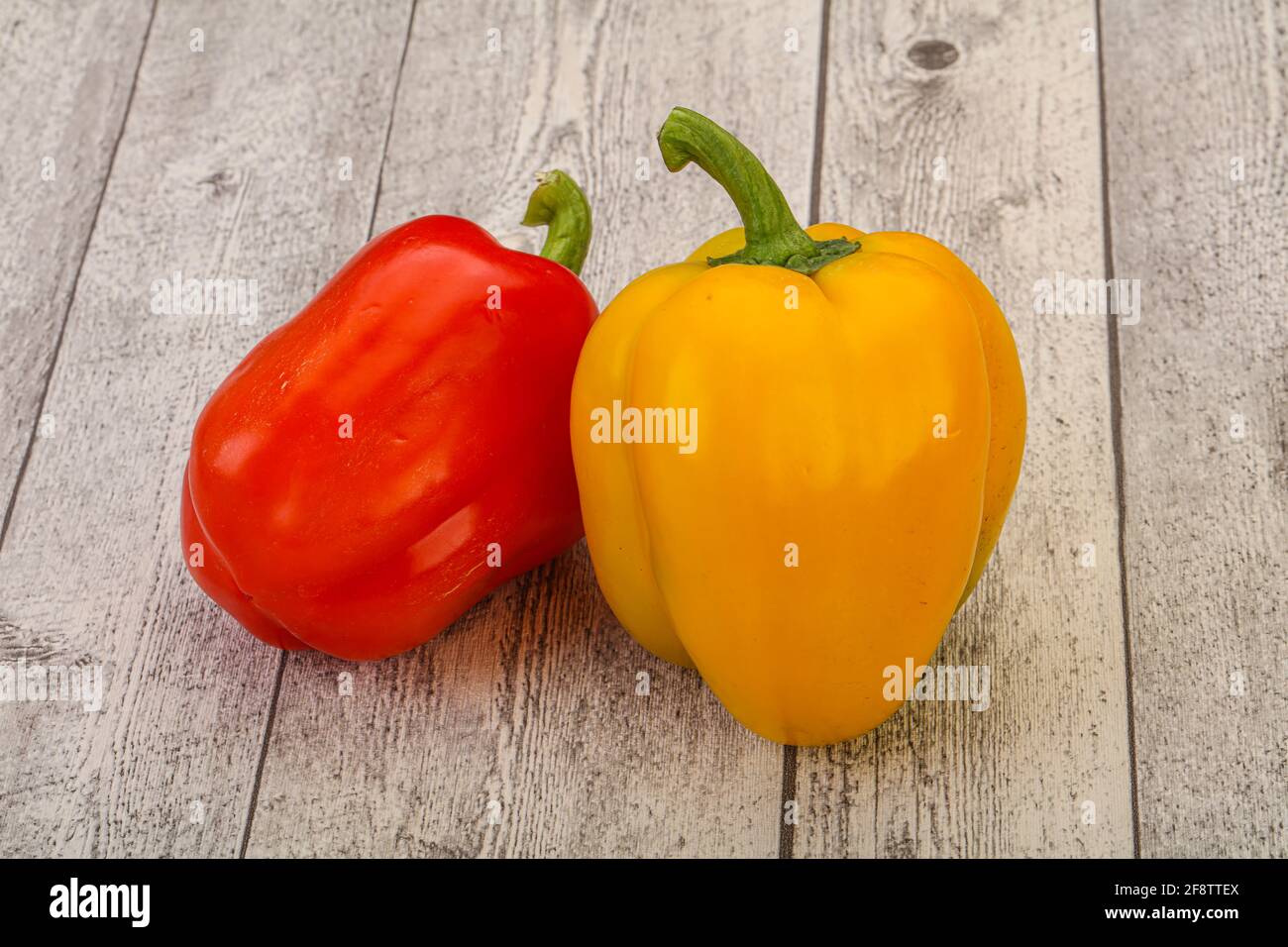 Two Ripe sweet Bulgarian bell peppers Stock Photo - Alamy