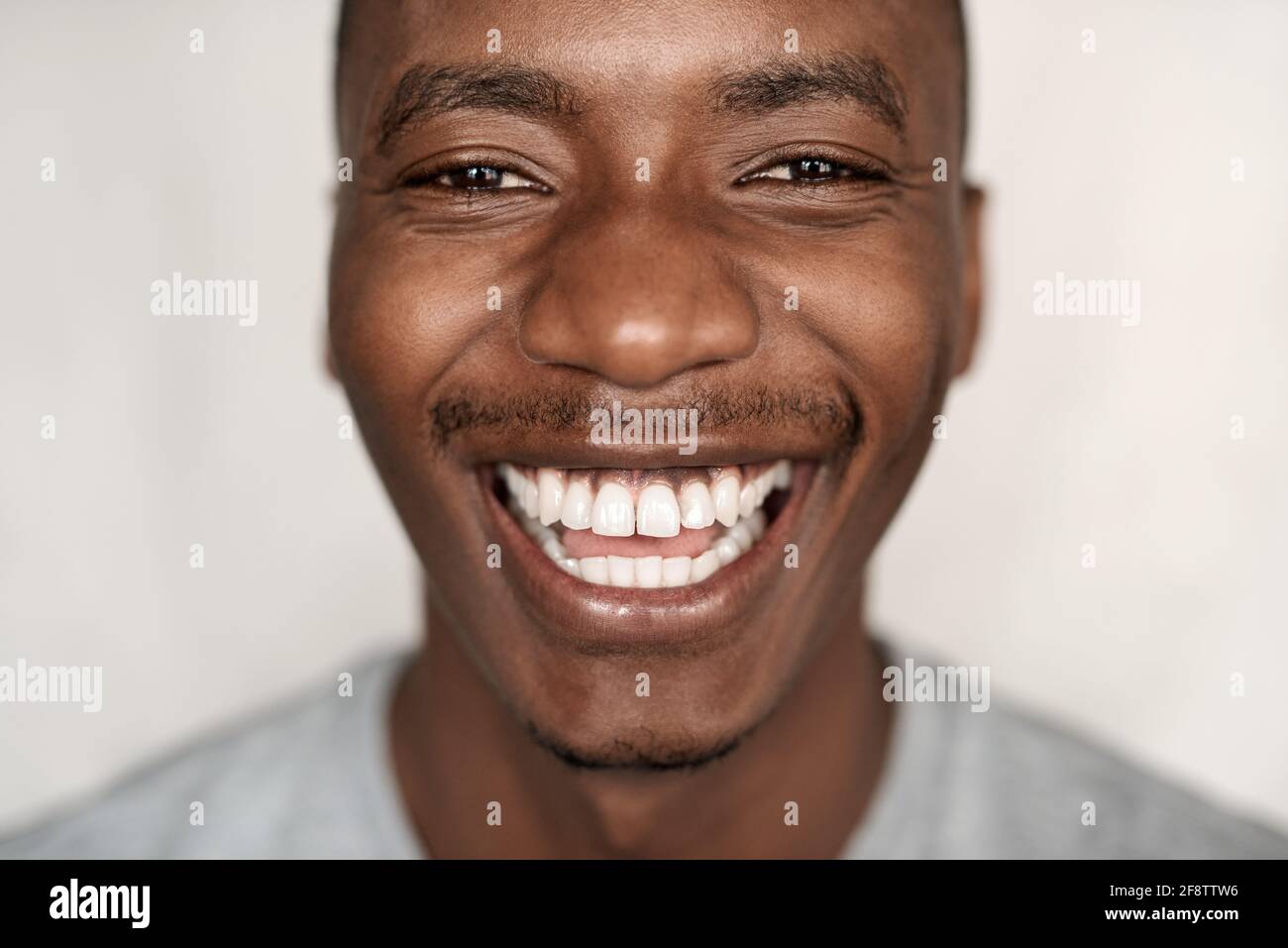 Ethnicity teeth laughing african american hi-res stock photography and ...