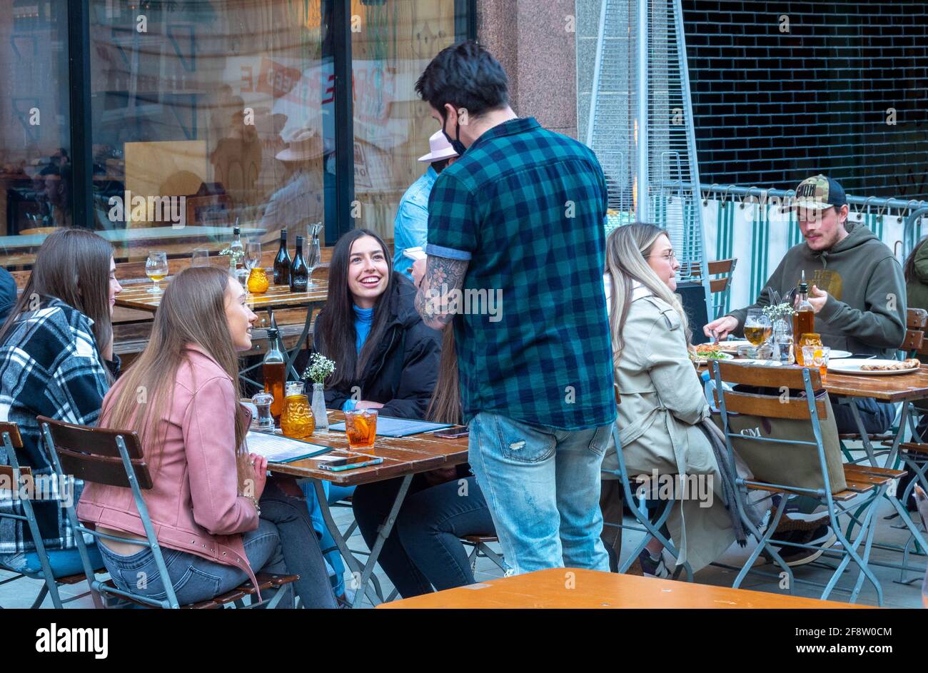Young women having a drink in a Liverpool cafe Stock Photo - Alamy