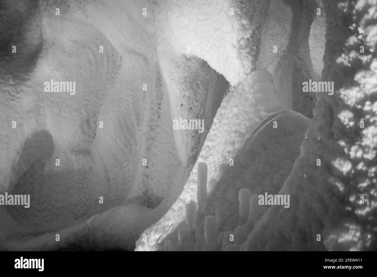 A fabulous artificial ice cave, the walls are covered with snow and ...