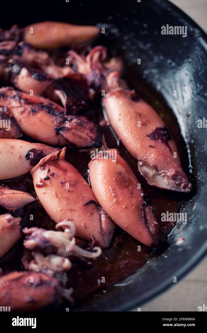 Squid eating fish hi-res stock photography and images - Alamy