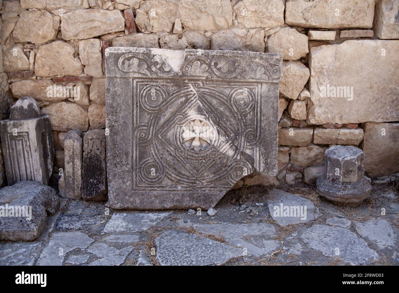 Bas reliefs on the ancient stone. religious patterns carved in stone ...
