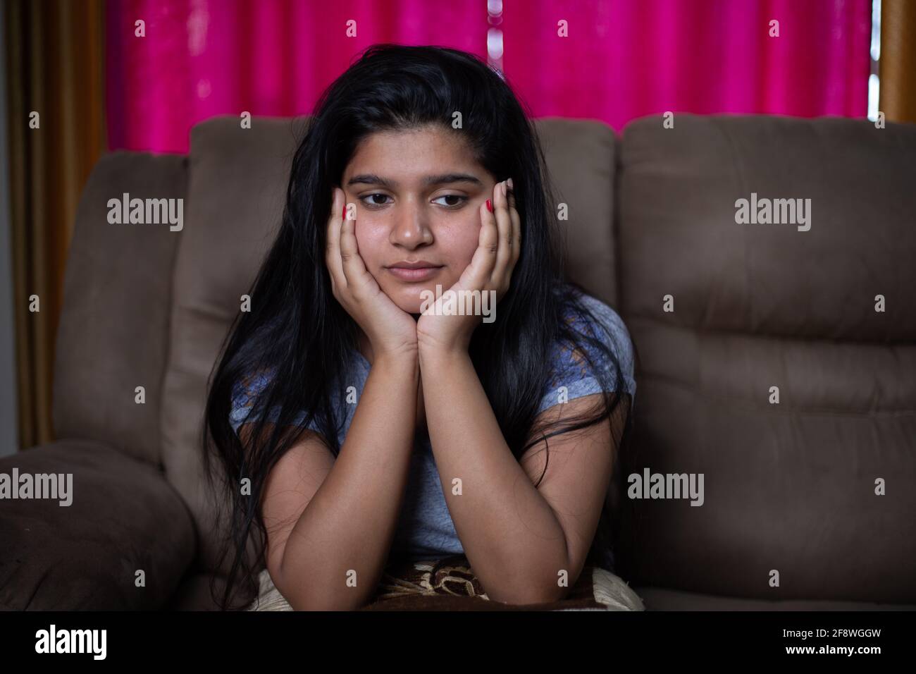 Sad indian girl hi-res stock photography and images - Alamy