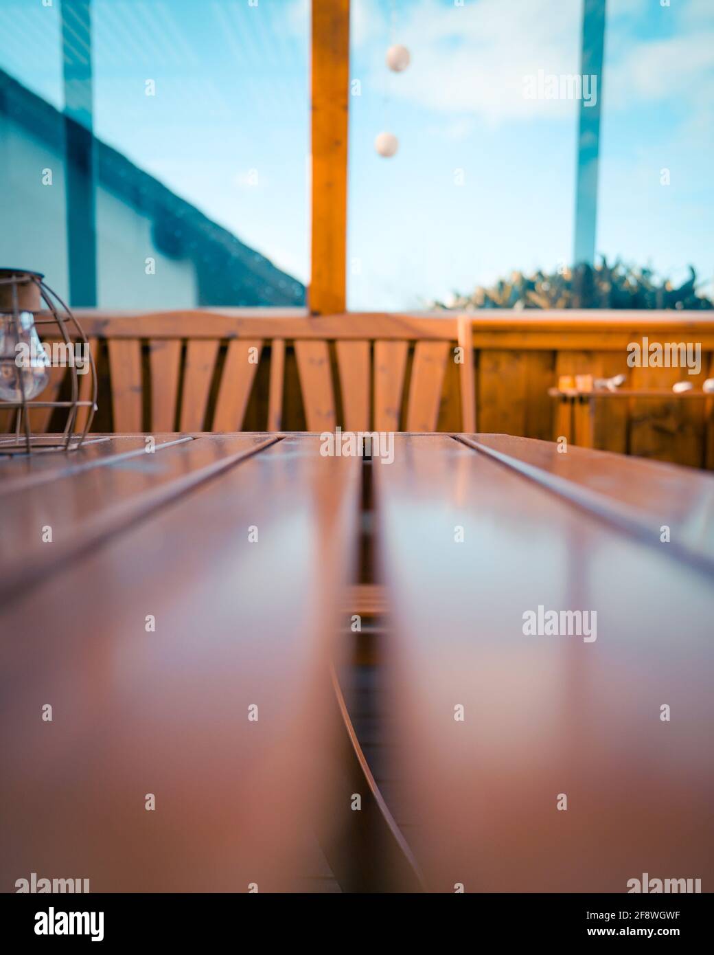 Vertical shot of a wooden table surface at the balcony Stock Photo - Alamy