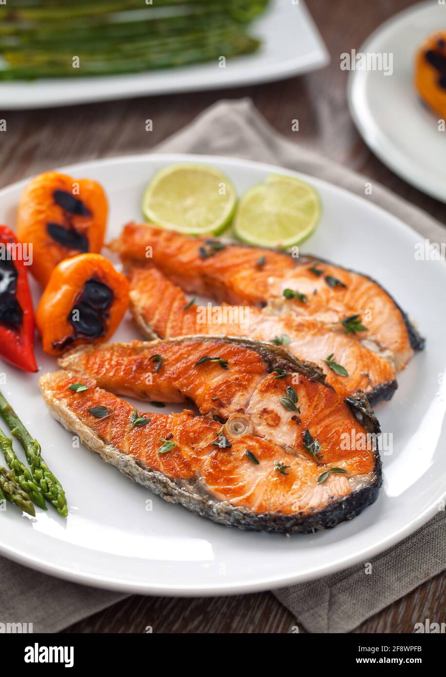 Portion of grilled salmon on a plate hi-res stock photography and ...