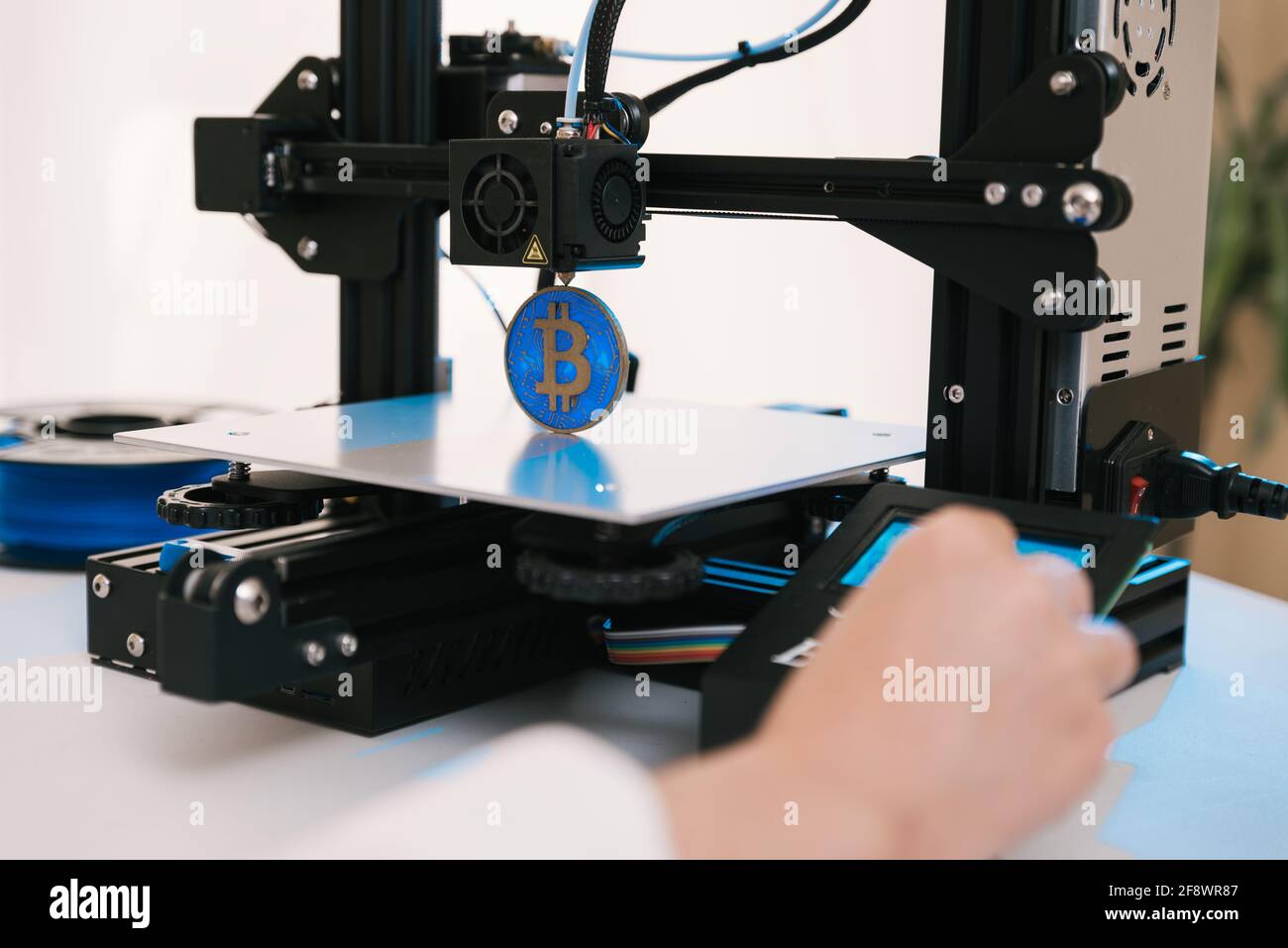 New generation of 3D printing machines printing a plastic part. For use ...