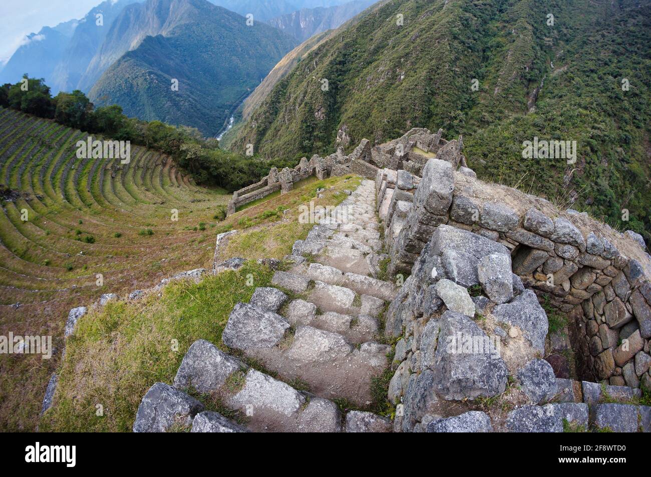 Nice view of the ruins of ancient terraced Inca city of Winay Wayna ...