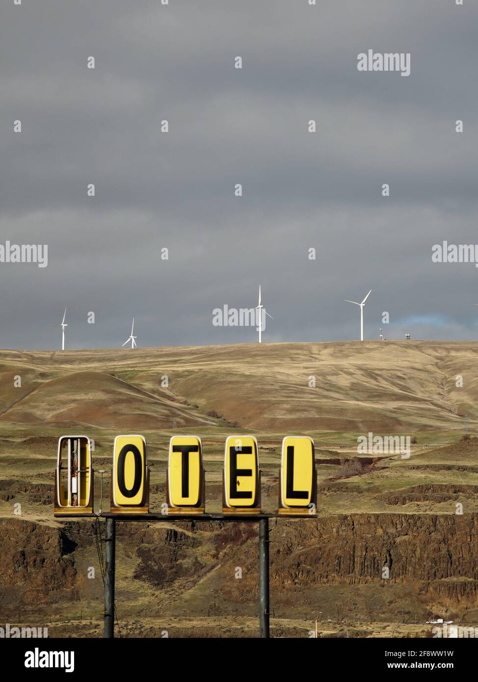 Hotel sign shot on the wind energy turbine background Stock Photo - Alamy