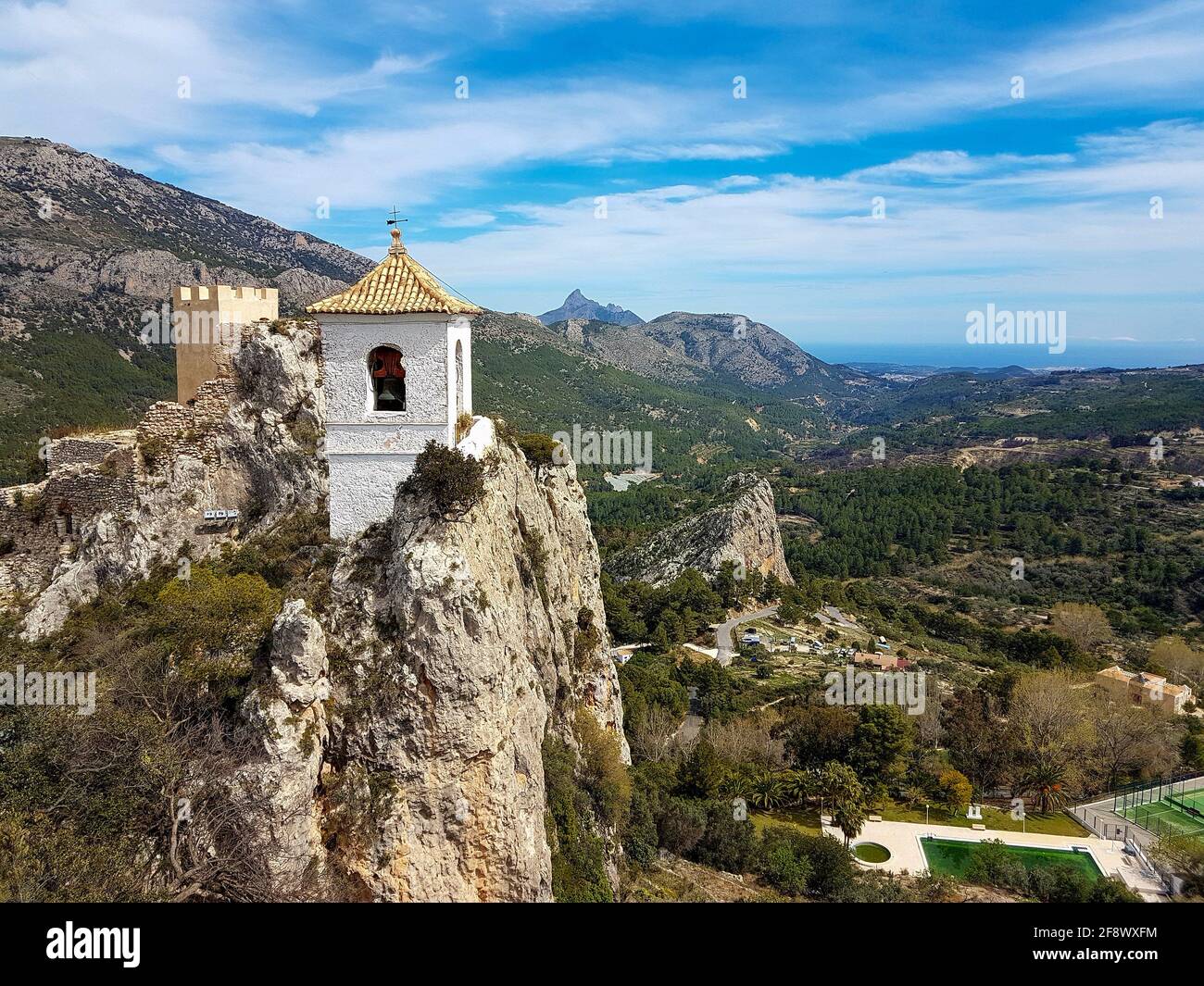 El Castell de Guadalest - Castle in Guadalest with cloudy sky Stock ...