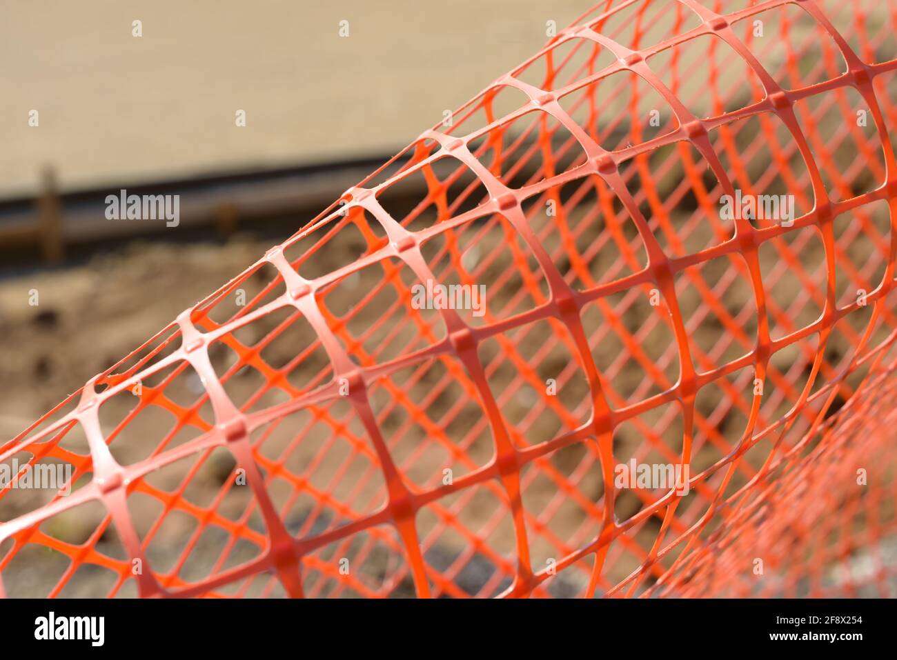 Plastic safety net for construction site. Construction mesh on winter ...