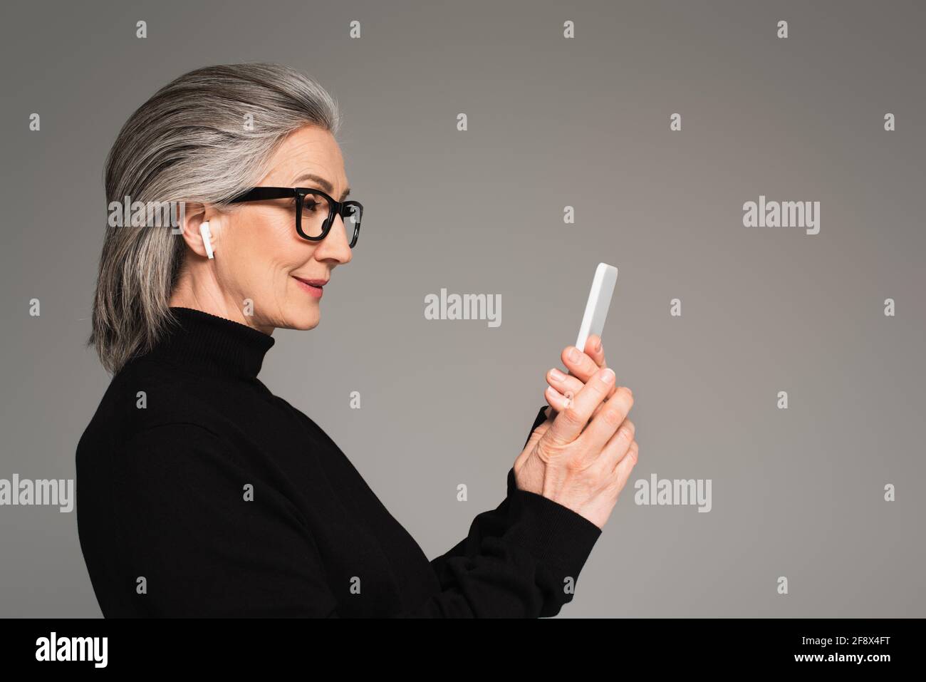 Mature woman in business suit hi-res stock photography and images - Alamy