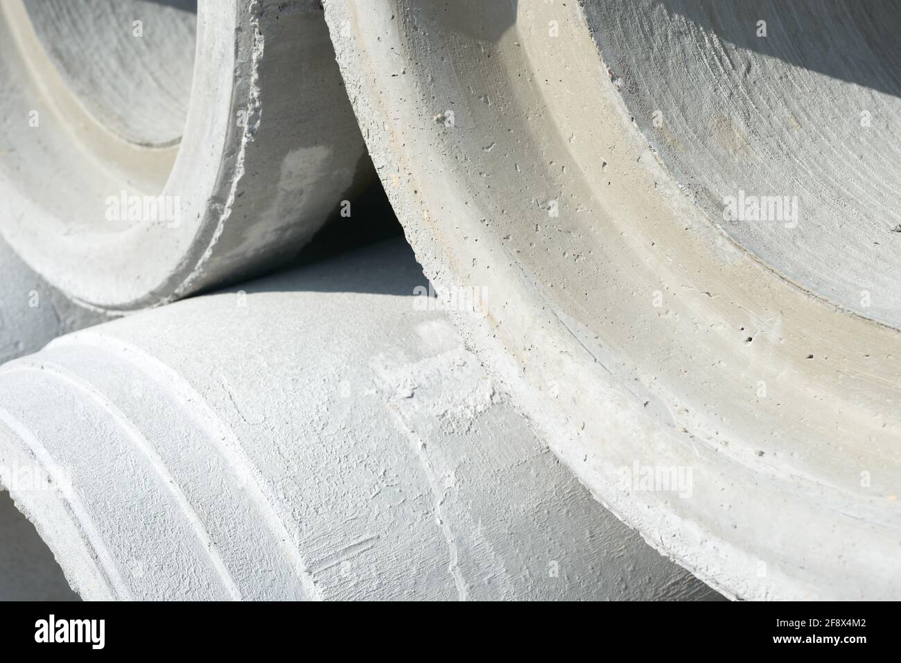 Industrial concrete drainage pipes stacked for construction. New tubes Stock Photo - Alamy