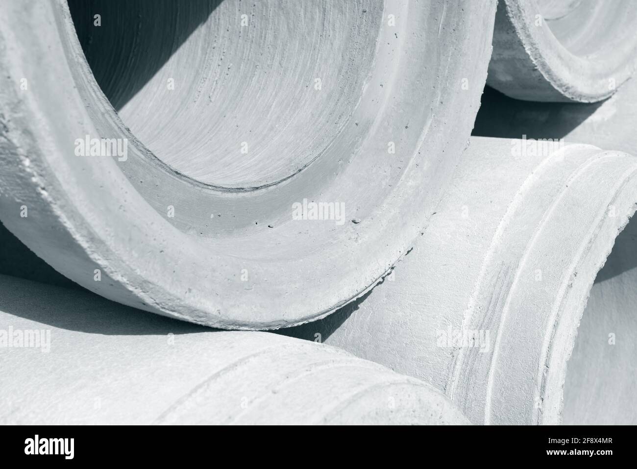 Industrial concrete drainage pipes stacked for construction. New tubes Stock Photo - Alamy