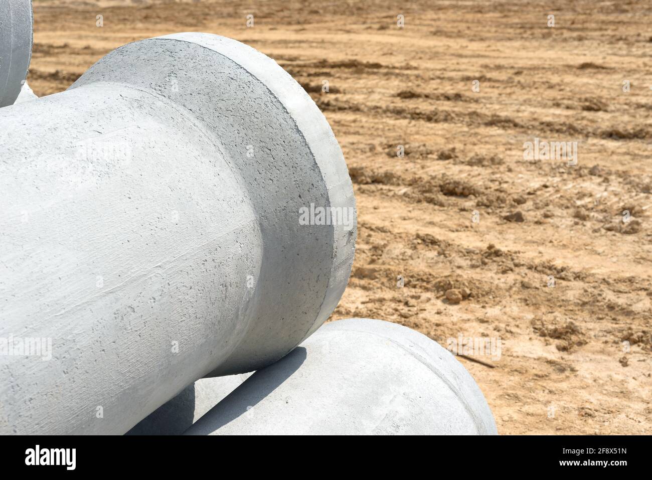 Industrial concrete drainage pipes stacked for construction. New tubes Stock Photo - Alamy