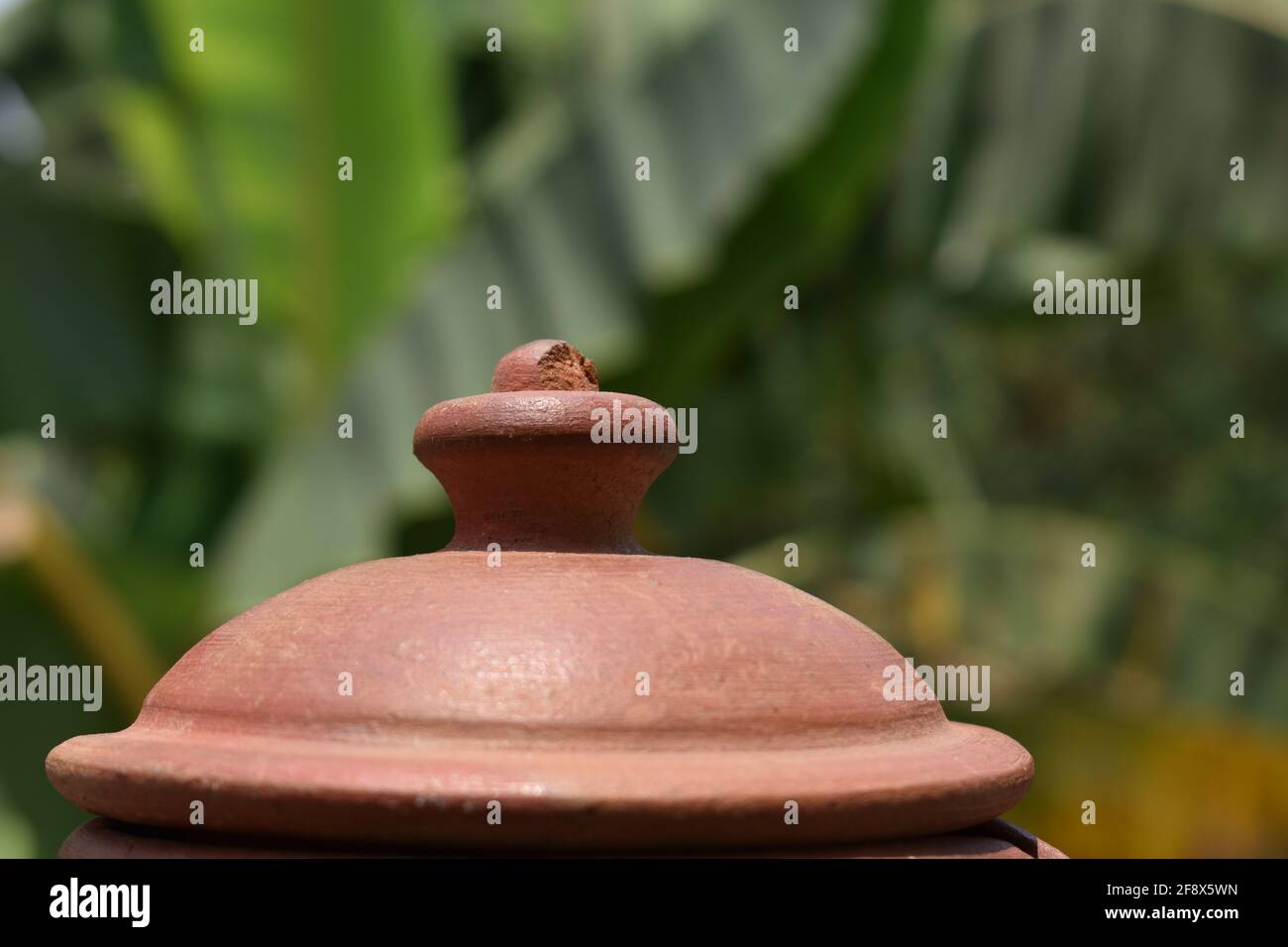 Traditional handmade pot in the natural background Stock Photo - Alamy