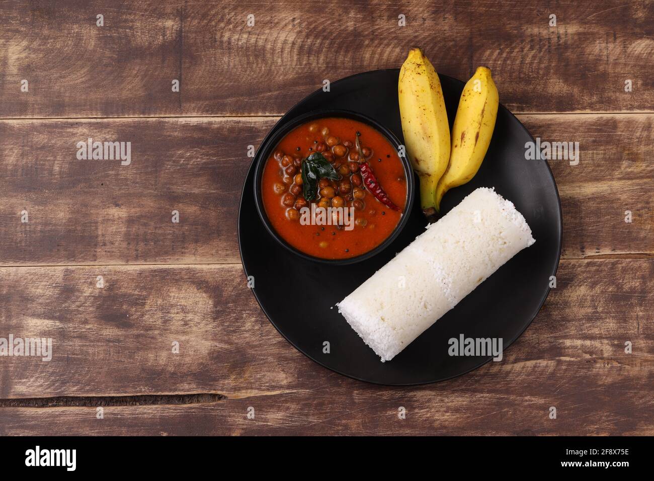 Puttu,Raw rice puttu,Arisi Maavu Puttu with chana or kadala curry ...