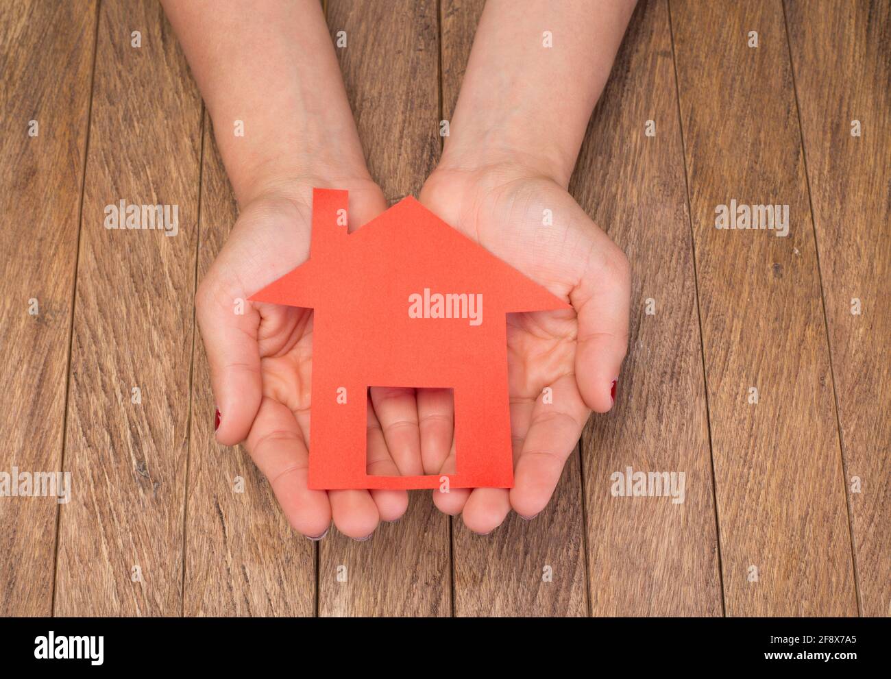 Hands man protecting paper hi-res stock photography and images - Alamy