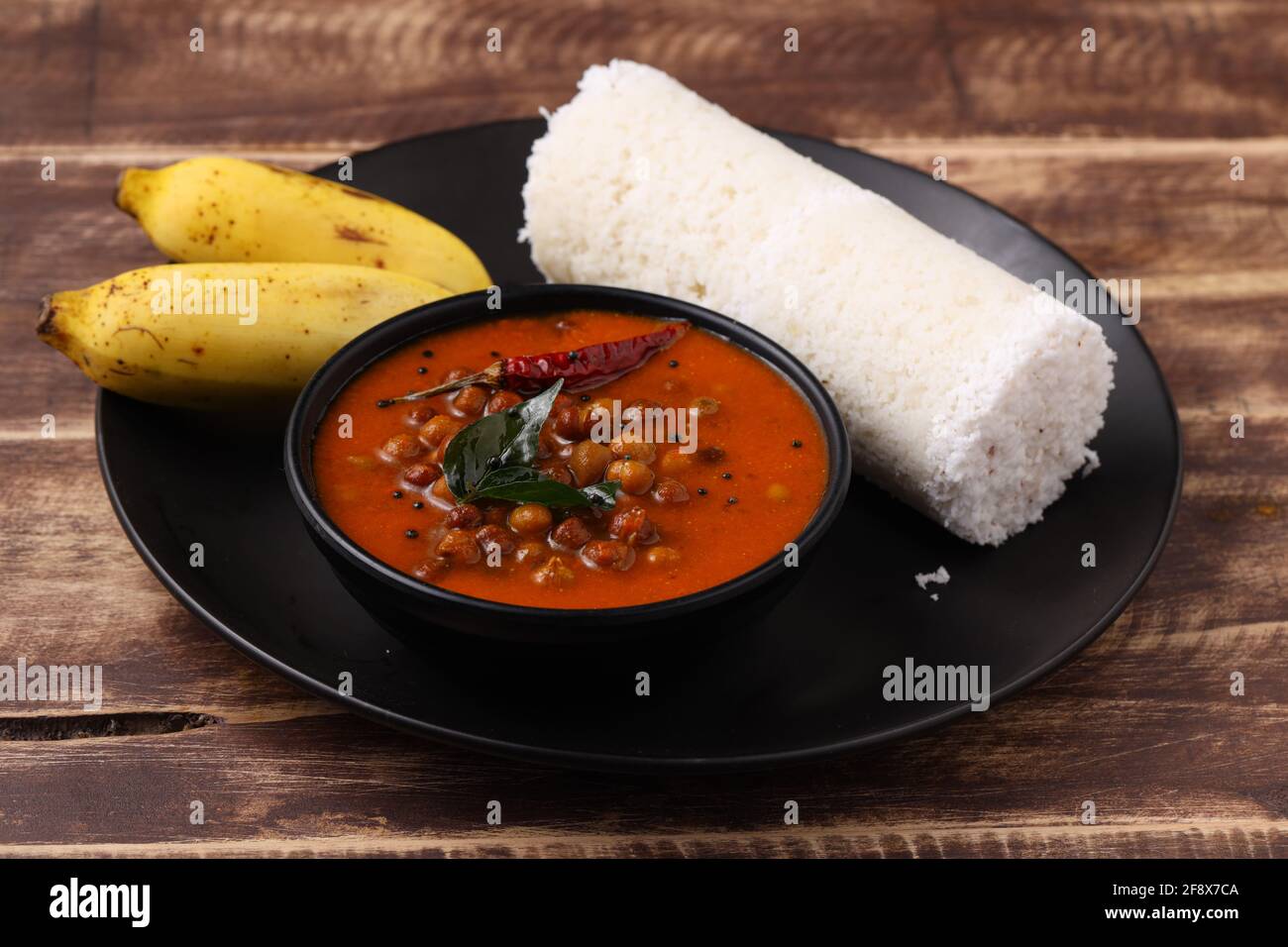 Puttu,Raw rice puttu,Arisi Maavu Puttu with chana or kadala curry ...