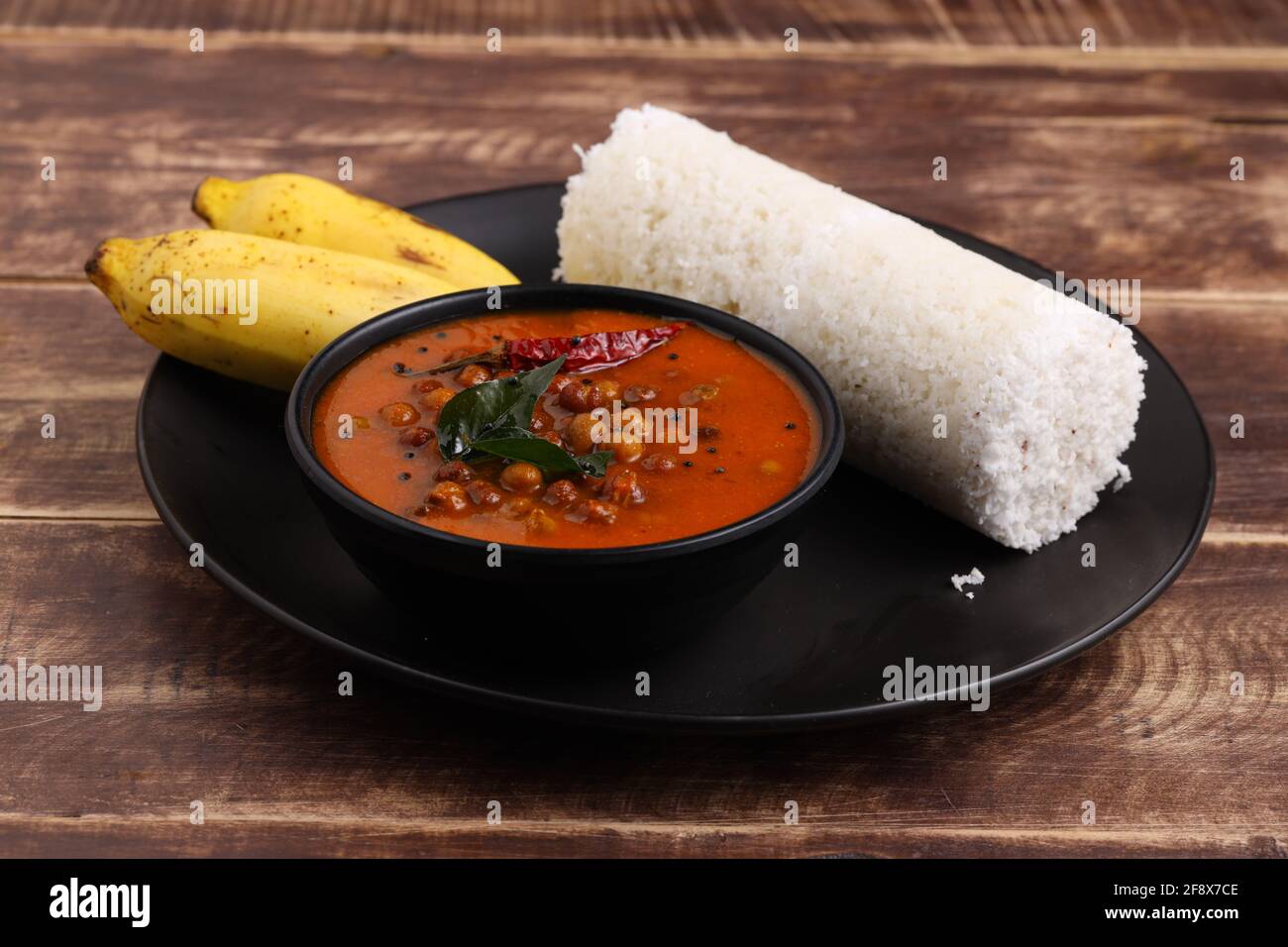 Puttu,Raw rice puttu,Arisi Maavu Puttu with chana or kadala curry ...