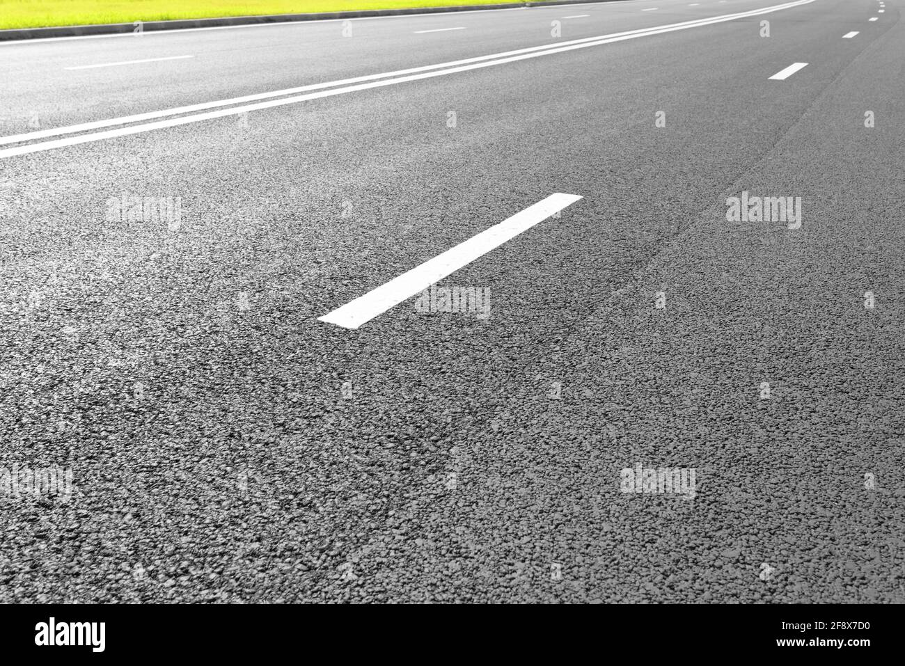 Asphalt road with marking lines white stripes Stock Photo - Alamy