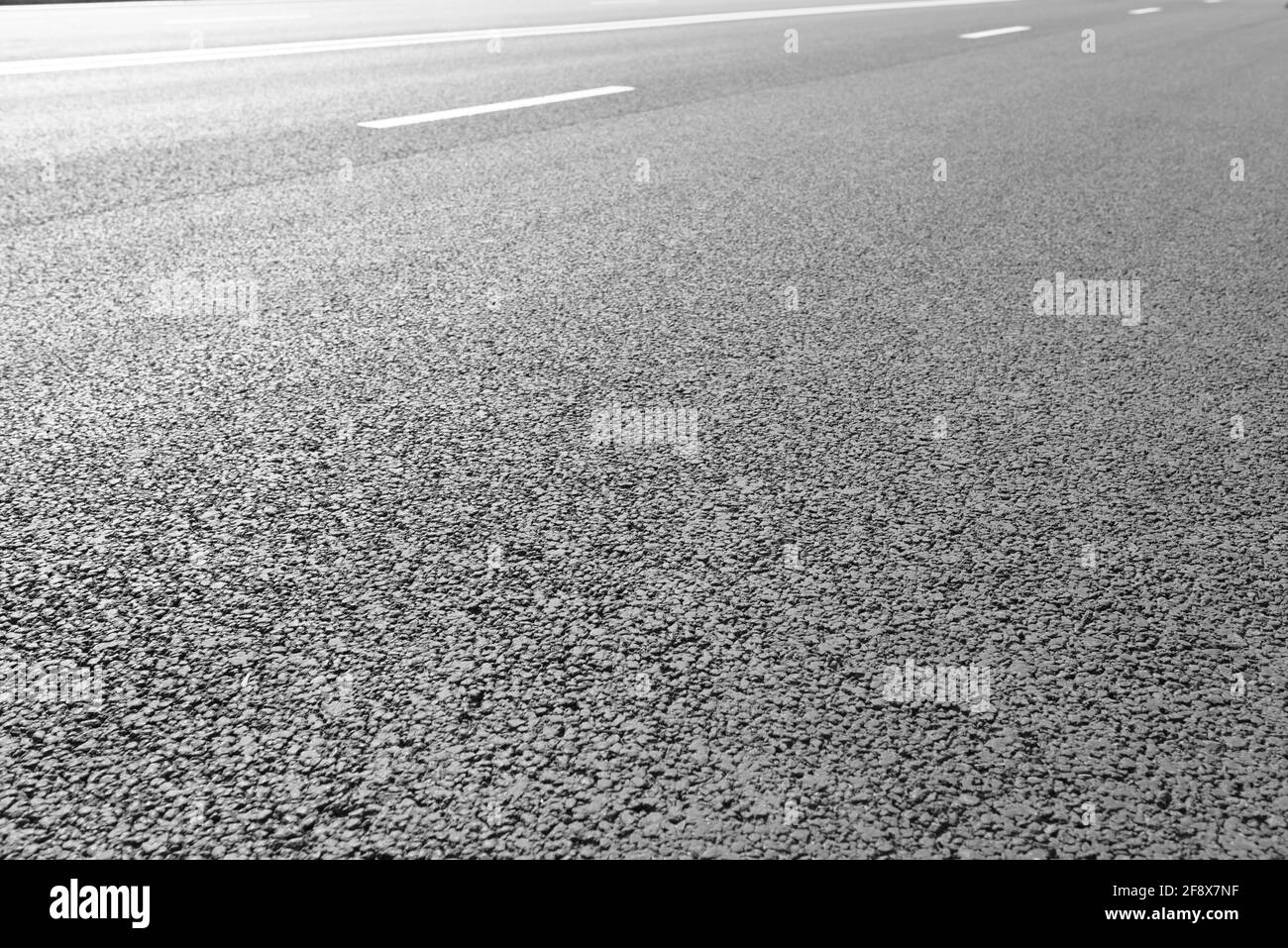 Asphalt road with marking lines white stripes Stock Photo - Alamy