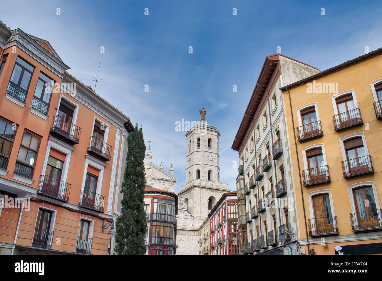 Streets in the historic center of Valladolid with the bell tower of the ...