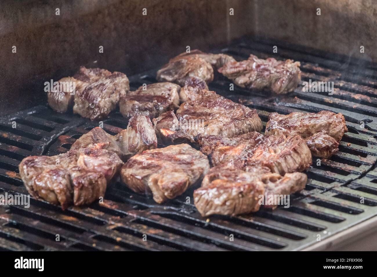 Barbecue grill gourmet fillet entrecote steaks at summer party ...