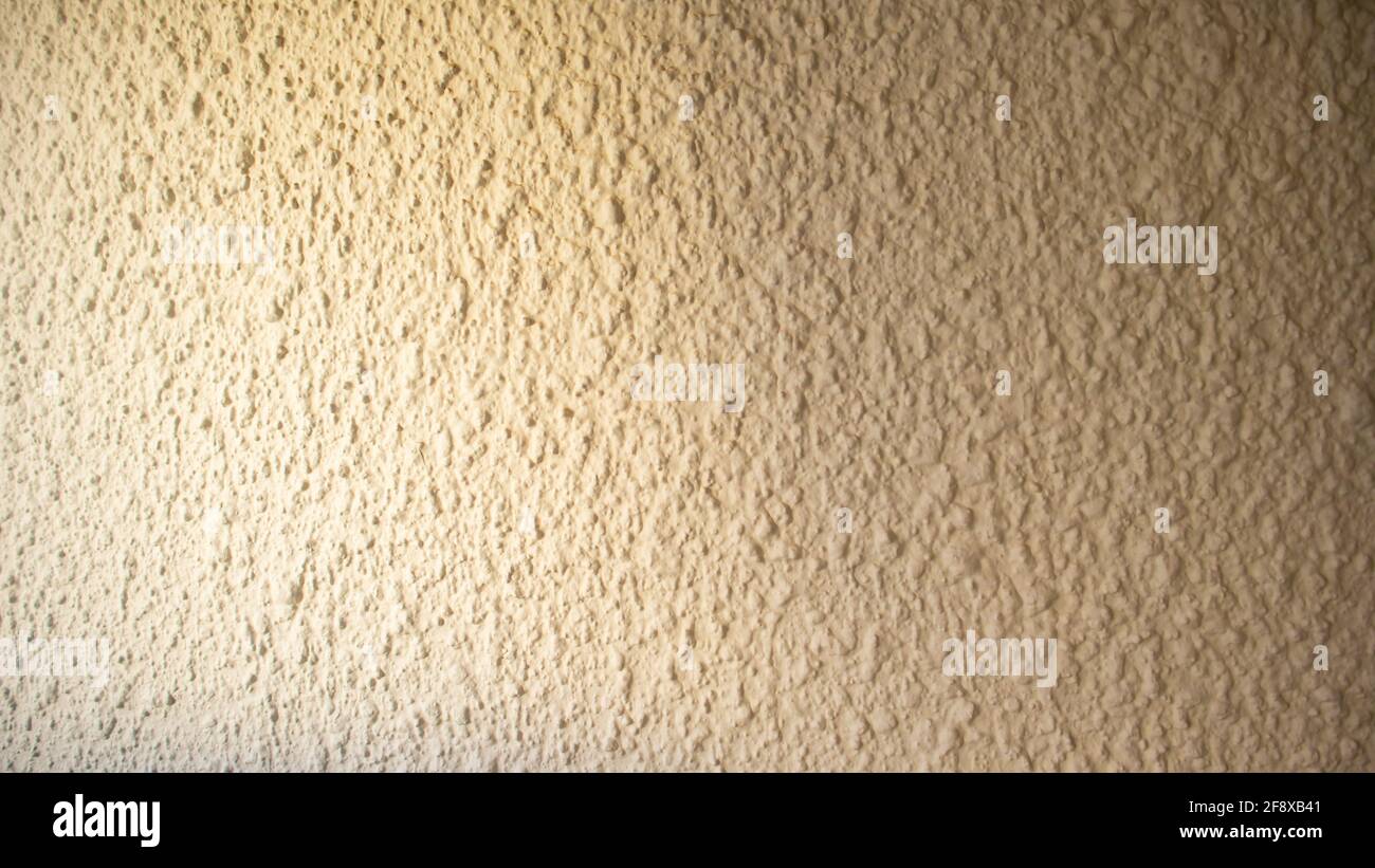 Cape Town, South Africa - 06-04-2021 Bumpy textures of a painted cement ...