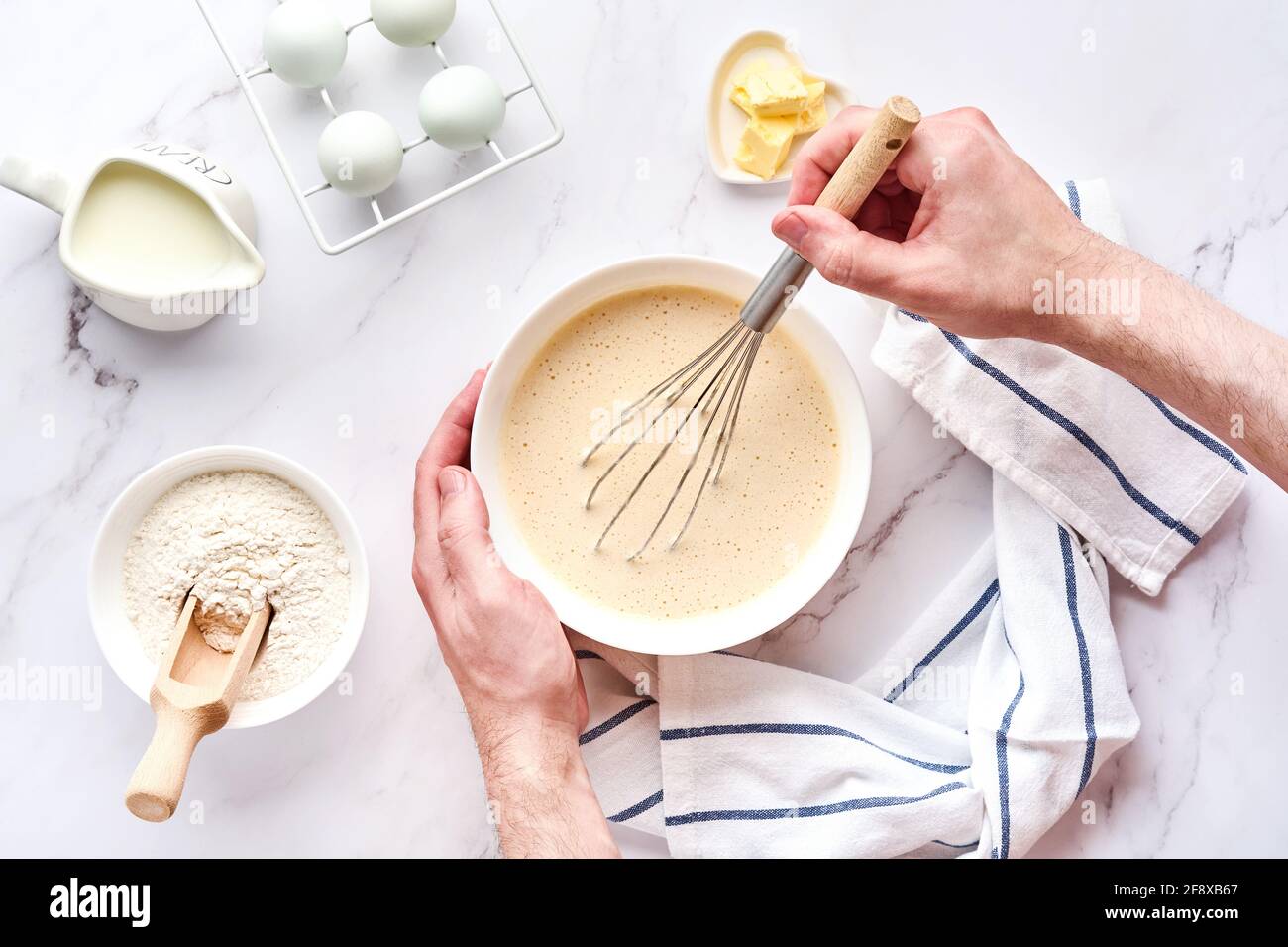 Whipping dough hand whisk in hi-res stock photography and images - Alamy