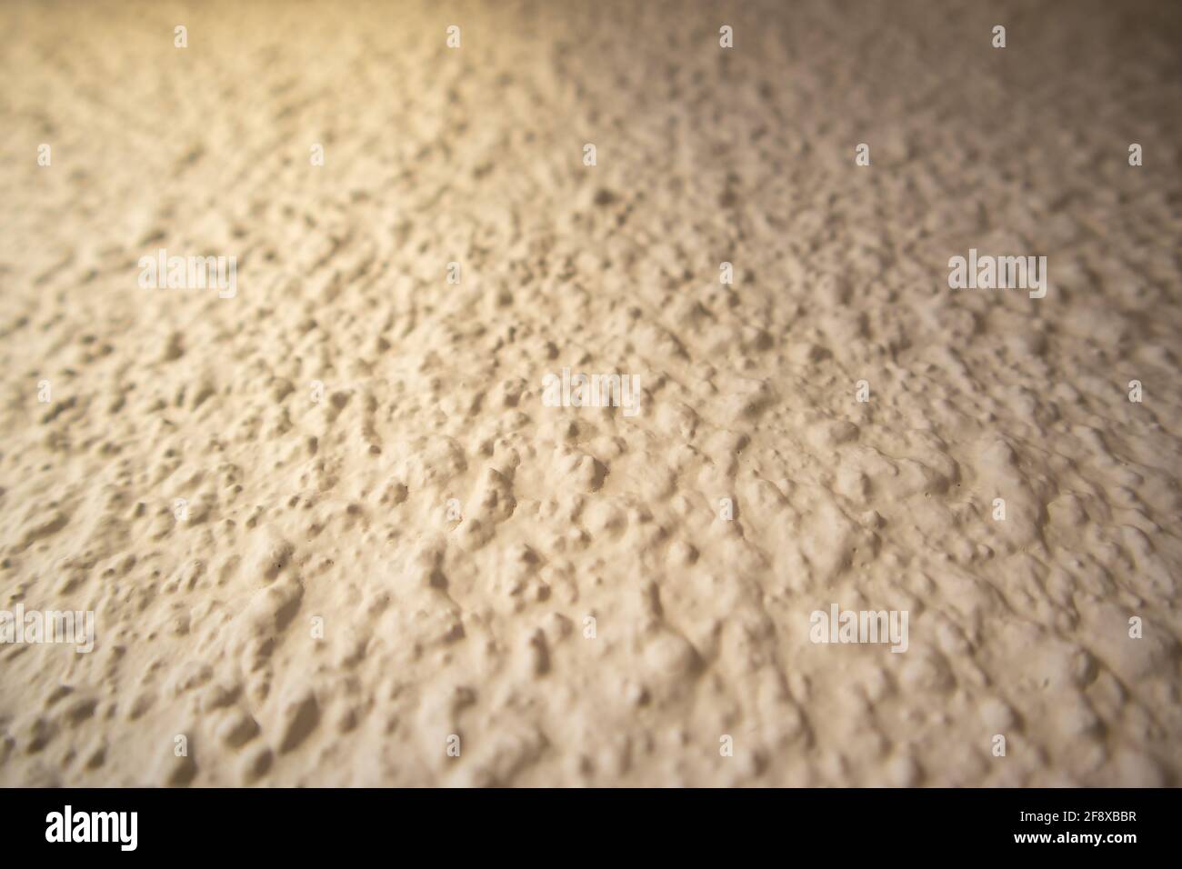 Cape Town, South Africa - 06-04-2021 Bumpy textures of a painted cement ...