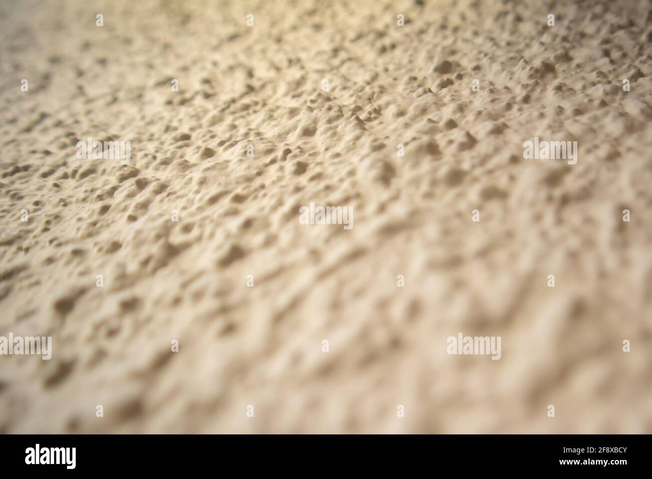 Cape Town, South Africa - 06-04-2021 Bumpy textures of a painted cement ...