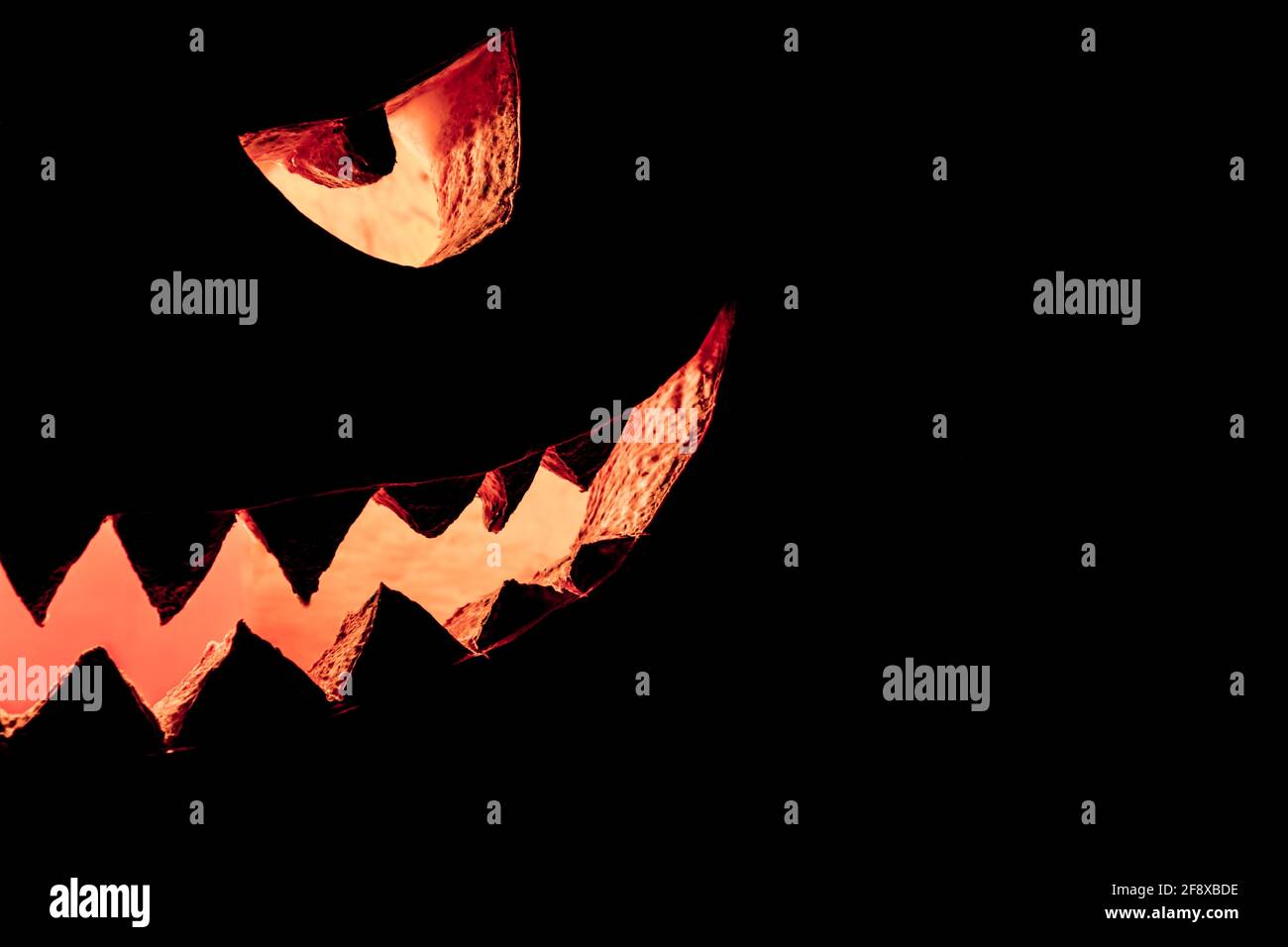 Halloween pumpkin half face smile hot burning fire eyes mouth. Big ...