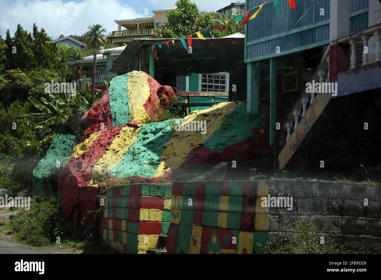 Grenada St John Area House and Rocks Painted in Rasta Colours Stock ...