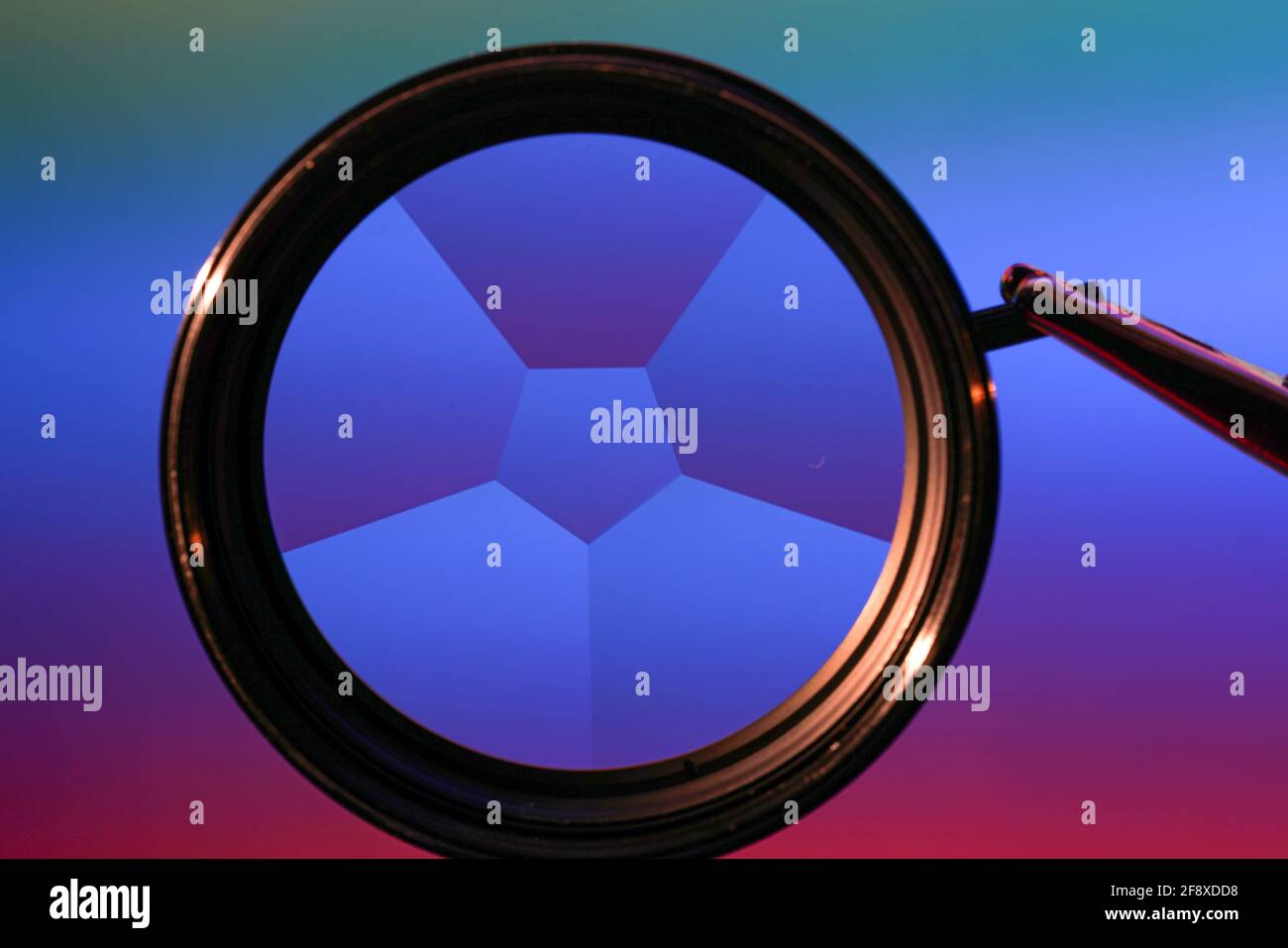 Magnifying glass on a colorful background Stock Photo - Alamy