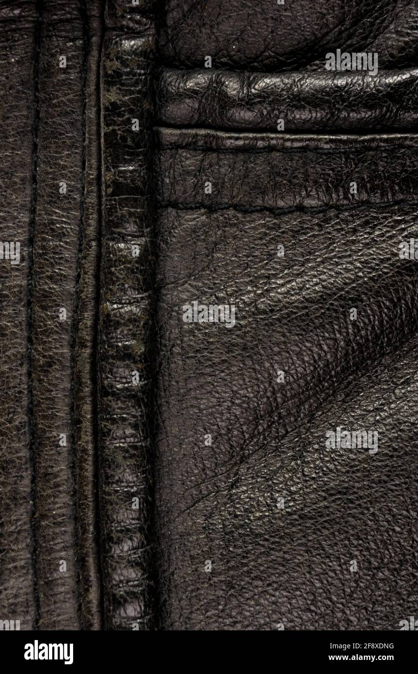 Old vintage genuine soft black leather texture background, top layer ...