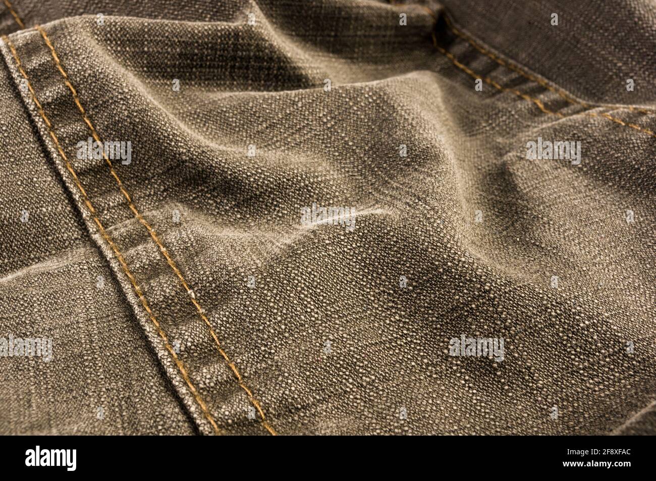 clothing items washed cotton fabric texture with seams, clasps, buttons ...