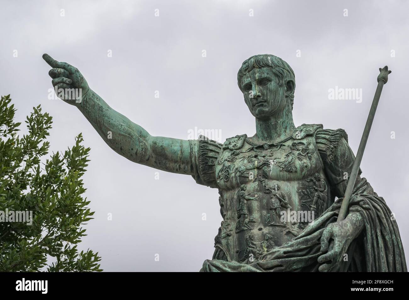 Low-angle shot of a bronze sculpture of Emperor Augustus of Rome on the ...