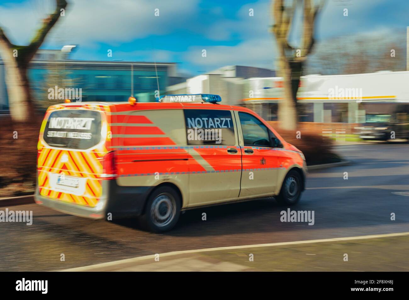 Emergency Ambulance At Fast Speed Stock Photo - Alamy
