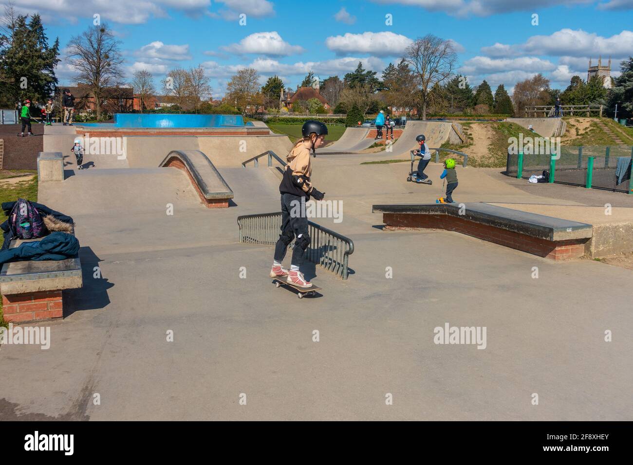 Children playing with scooters at the skate park in Sol Joel Park in ...