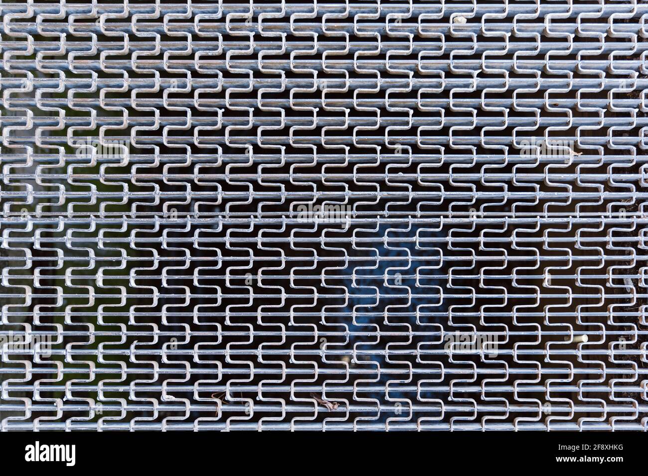 Close up of iron grid texture background silver metal pattern on the ...