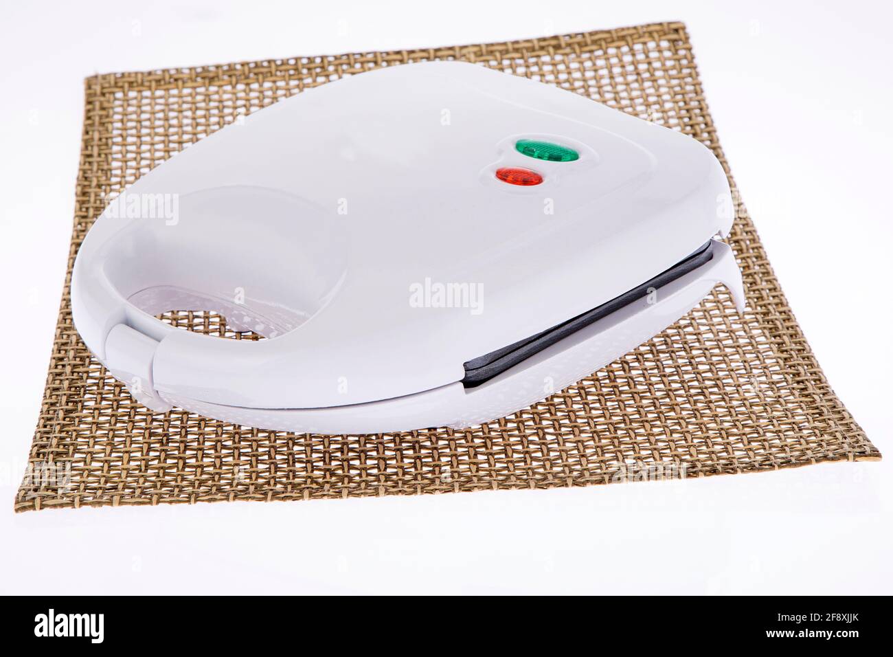 Open sandwich toaster with ingredients on white background Stock Photo ...