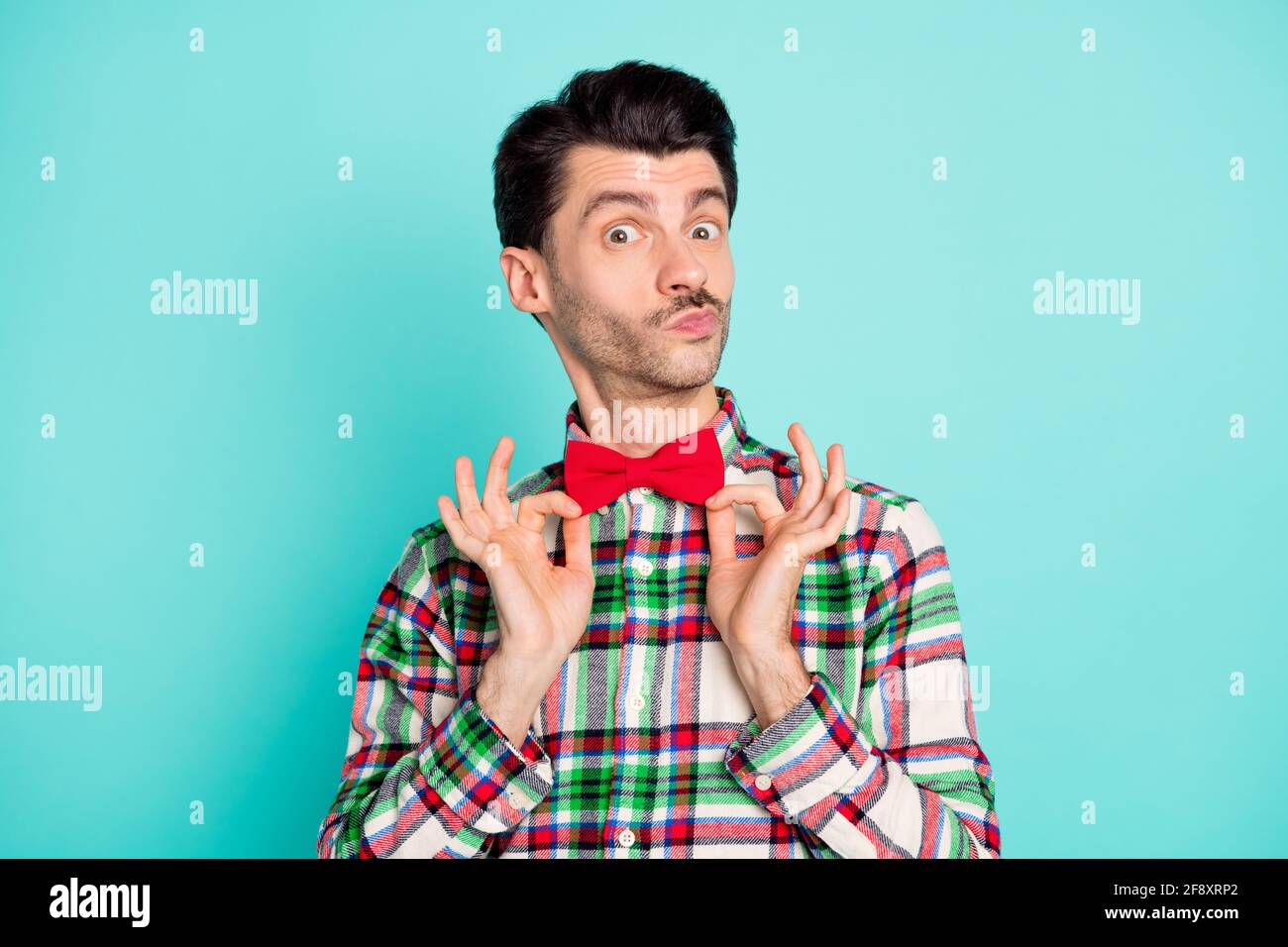 Photo of funny boyfriend guy twist lips look camera fingers bow tie ...